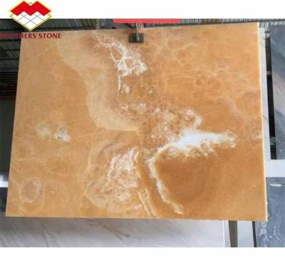 China Surface Finishing Polished Design Backlit Orange Jade Stone for Basin and Dining Table for sale