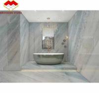 China Upgrade Your Living Staircase Hall with 20mm Blue Ice Onyx Stone Veneer and Backlight for sale