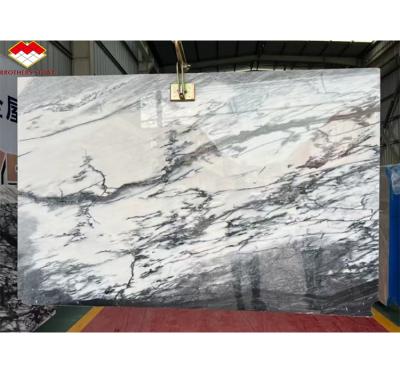 China Snow Mountain White Marble Big Slab for Modern Design Dining Table Top Natural Stone for sale