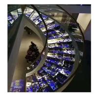 China Indoor Modern Design Style Multicolour Onyx Wood Vein Marble Stairs with Glass Railing for sale