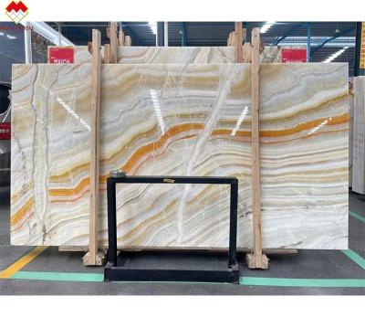 China Translucent Rainbow Onyx Stone for Villa Background CNF Polished Red Dragon Onyx Marble for sale