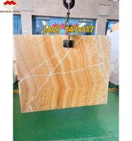 China Thickness Tolerance /- 1mm Antique Book Match Yellow Onyx Marble for Lavabo Component for sale