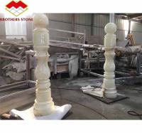 China Modern Onyx Marble Column Polished Natural Stone Design for Staircase Pillars for sale