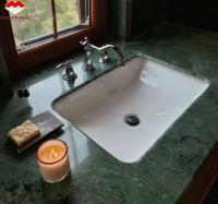 China Calcite Dark Green Marble for Modern Design Villa Bathroom Sink and Dining Table for sale