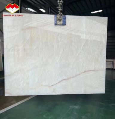 China Luxury ICE AGE Jade Onyx Natural Marble Stone Transparent Royal White Onyx Tile For Wall Decoration for sale