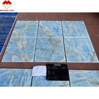China Light Blue Marble Jade Onyx Slab for Customized Cut-to-size Tiles Golden Veins for sale