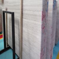 China New fashion natural stone wood grain grey marble for sale