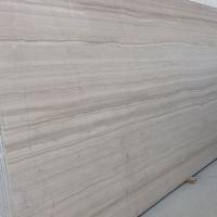 China China high quality athens wood grain sunny grey marble price for sale