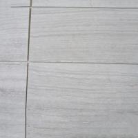 China 2018 Wholesale low price wood grain glazed sunny grey marble for sale