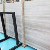 China 2018 Wholesale low price wood grain glazed sunny grey marble for sale