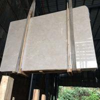 China Calcite Ultraman Beige Marble Stone Slab Cut To Size For Sink And Basin for sale