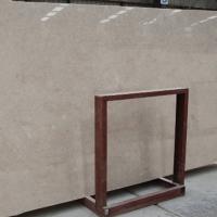 China Calcite Ultraman Beige Marble Stone Slab Cut To Size For Sink And Basin for sale