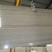 China New good quality custom size polished wood grain marble for sale