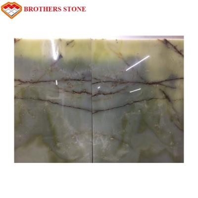 China Natural Polished Light Green Onyx Stone Customized Size For Wall Decoration for sale