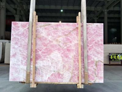 China Backlit Ice Age Onyx Marble Wall Panel Translucent Crystal Pink Onyx Countertop for sale