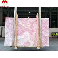 China Backlit Ice Age Onyx Marble Wall Panel Translucent Crystal Pink Onyx Countertop for sale