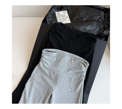 China Women’s Two-Piece Set with Long Sleeve Wrap-Front Crop Top and Gathered Waist Flared Pants Featuring High Slit for sale