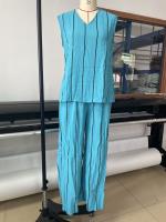 China Women's Two-Piece Set with Vertical Contrast Stripe Detail, Sleeveless V-Neck Top and Long Wide Leg Pants for sale