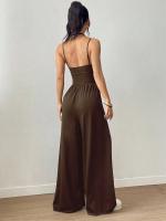 China Women's Denim Halter Neck Wide Leg Jumpsuit with High Waist and Flowing Silhouette for sale