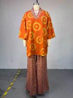China Men’s African Print Two-Piece Set with V-neck Collar and Wide-Leg Trousers in African Wax Print Fabric for sale