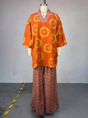 China Men’s African Print Two-Piece Set with V-neck Collar and Wide-Leg Trousers in African Wax Print Fabric for sale