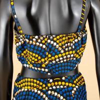 China Women's African Print Two Piece Set with Cotton Blend High Waist Trousers and Bold Geometric Ethnic Pattern for sale
