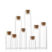 China 30ml/50ml/100ml Glass Bottles with Natural Cork Stoppers and Optional Decoration for Eco-Friendly Cosmetic Packaging for sale