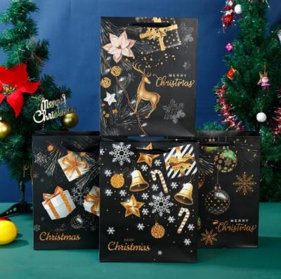 China Rectangle 40gsm-150gsm Custom Cardboard Bags Bronzing Christmas Paper Bags With Handles for sale