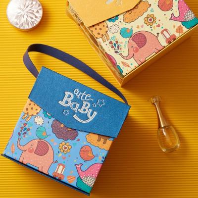 China Cartoon flip gift box with artificial leather handle baby shower birthday gift packaging boxes for sale