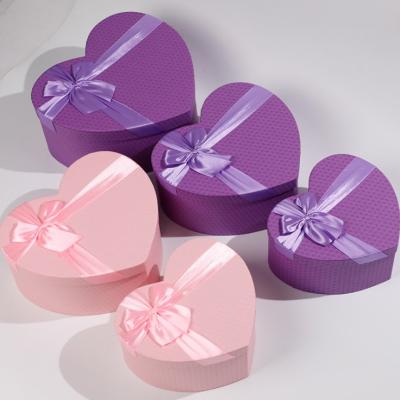 China Heart Shaped Bow Knot Chocolate Paper Packaging Boxes Purple Color for sale