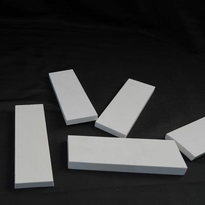 China High Chemical Resistance Alumina Ceramic Tiles White Surfaces In Industrial Settings And Chemical Processing Plants for sale