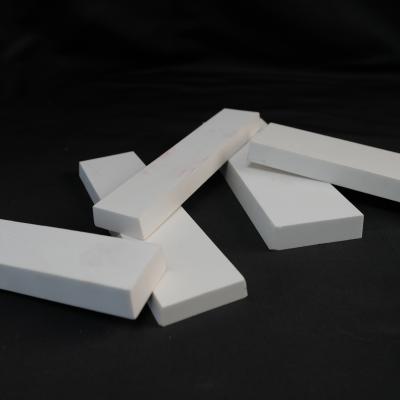 China High-Performance Alumina Ceramic Tiles with 2000 MPa Compressive Strength, 3.6-3.9 G/cm³ Density, and Excellent Chemical Resistance for sale