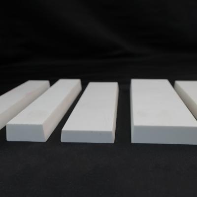 China 95% Alumina Content Alumina Ceramic Tiles with 9 Mohs Hardness and 1600°C Temperature Resistance for Industrial Applications for sale