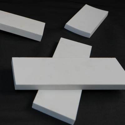 China White Alumina Ceramic Tiles 130*50*15mm with 2000 MPa Compressive Strength and Durable for Industrial Applications for sale