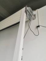 China Smart WiFi Roll Up Garage Door Opener 1000N 120kgs DC Motor Quiet for sale