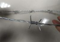 China BTO-22 Electric Galvanized PVC Coated Barbed Fencing Wire 2mm Diameter with 7.5-15cm Barb Spacing for sale