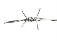 China 1.6mm HDG Reverse Twist Barbed Wire - Hot Dipped Galvanized Steel with 3-6 Inch Barb Spacing for Perimeter Security for sale