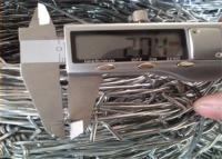 China 50kg Coil Galvanized Steel Barbed Wire 1.6mm Diameter for Security Fencing with 3-6 Inch Barb Spacing for sale