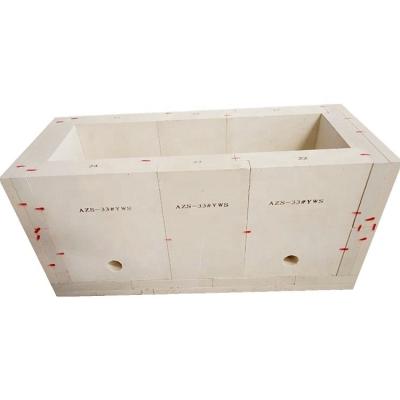 China Colored Glass Kiln Refractory Block Metering Spout with Heat Baffles and Plunger Feeder for sale