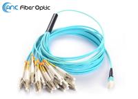 China Aqua Female 24F MPO Fiber Optic Cable Round 3.0mm 5M Breakout Patch Cord for sale