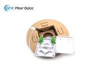 China 0.3dB 4 Core FTTH Fiber Optic Patch Cable Paper Spool With Small Wall Mount Box for sale