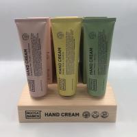 China Cosmetic Store Wood Display Holder Hand Cream Display Stand for sale