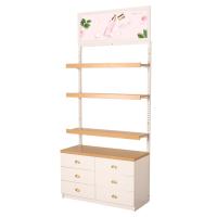 China Cosmetic Point Of Purchase Pop Display Wood Makeup Display Stand for sale