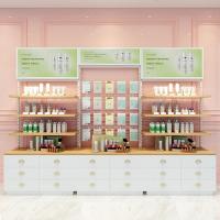 China Cosmetic Point Of Purchase Pop Display Wood Makeup Display Stand for sale