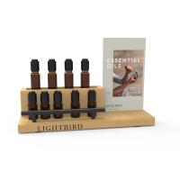 China Customizable Wooden Counter Display Rack With Printed Store Logo Cosmetics Counter Display Rack for sale