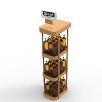 China Customizable Store Floor Standing Wooden Three Layer Display Rack Shelf For Wine for sale