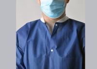 China Elastic / Knitted Cuff Disposable Safety Coveralls Medical Gown With V Collar And Pockets for sale