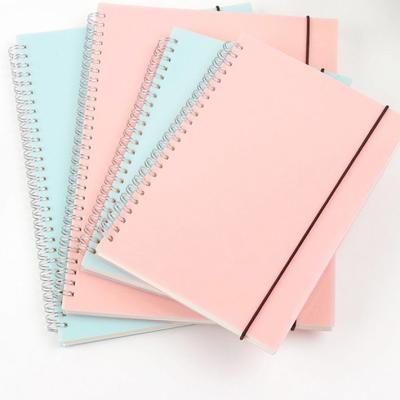 China Custom various color plastic cover spiral notebook for sale