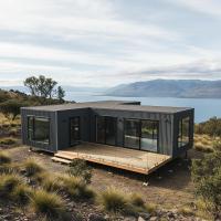 China Weather Resistant T Model Prefab House  Residential Living Steel Manufactured Homes for sale