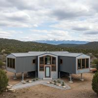 China Weather Resistant T Model Prefab House  Residential Living Steel Manufactured Homes for sale